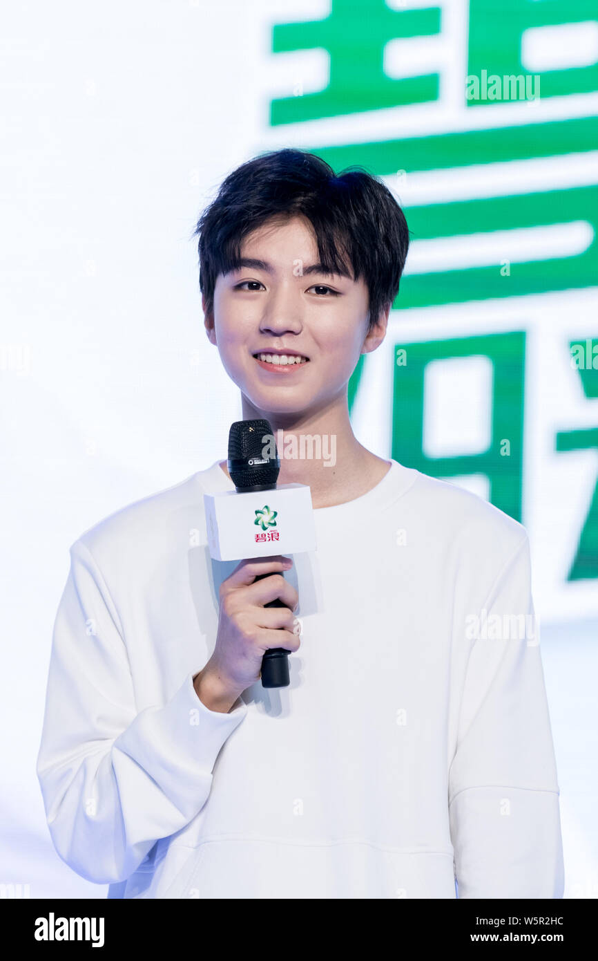 Karry Wang Jun Kai of Chinese boy group TFBoys attends a promotional ...