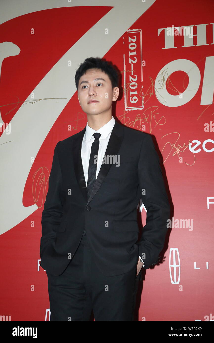 Chinese actor Qin Junjie poses as he arrives on the red carpet for the ...