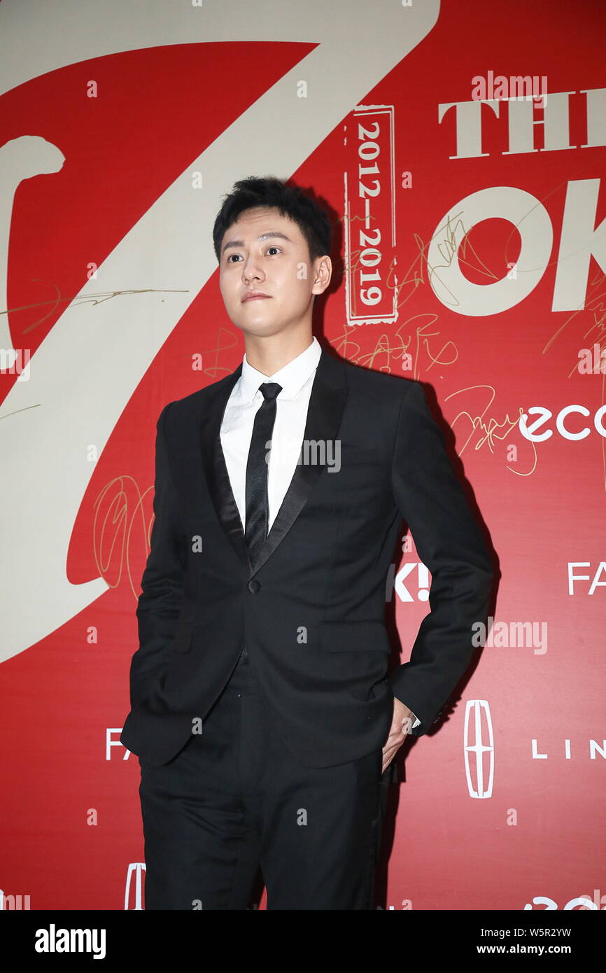 Chinese actor Qin Junjie poses as he arrives on the red carpet for the ...