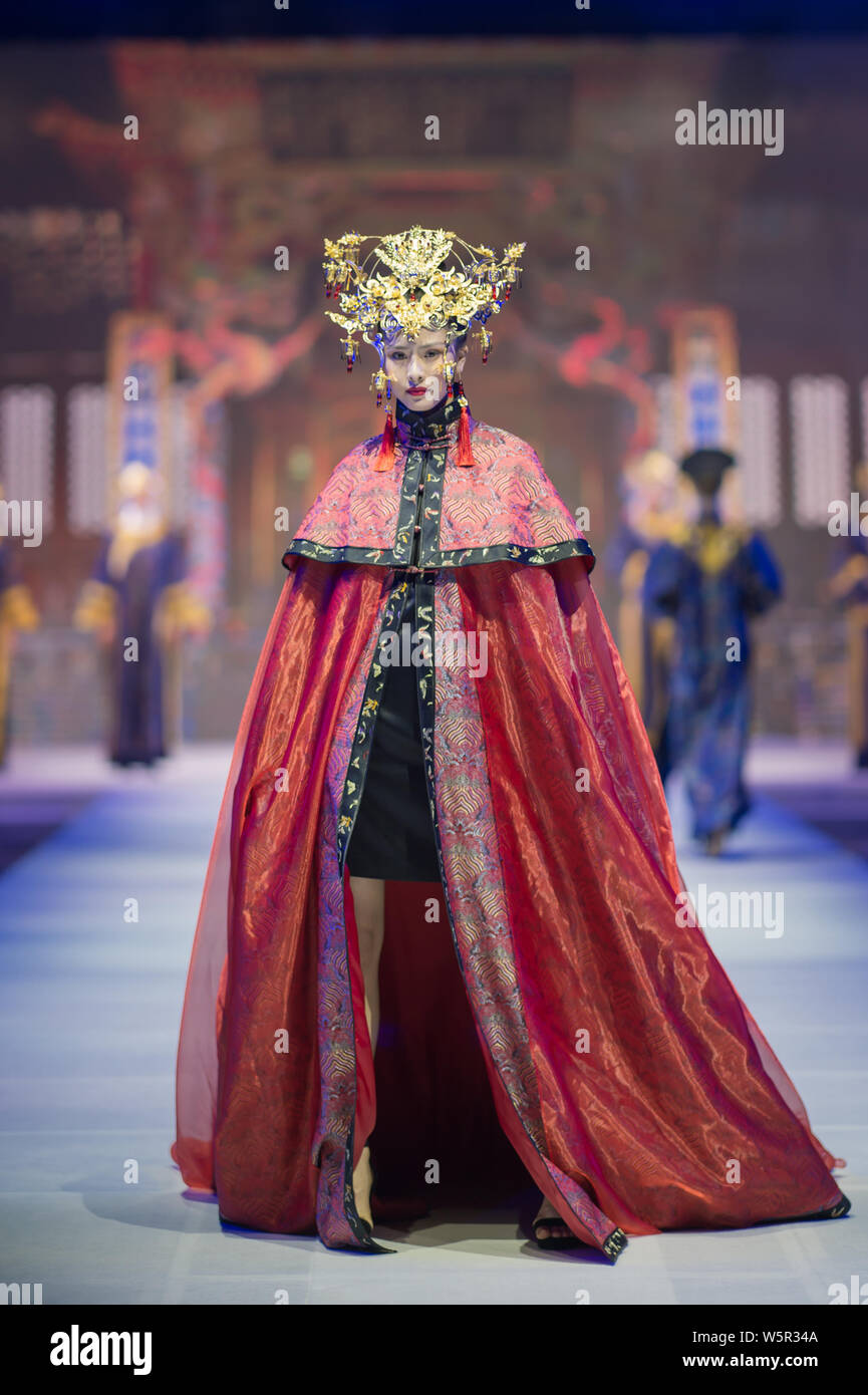 A model dressed in Cheongsam, a traditional Chinese dresses also known ...