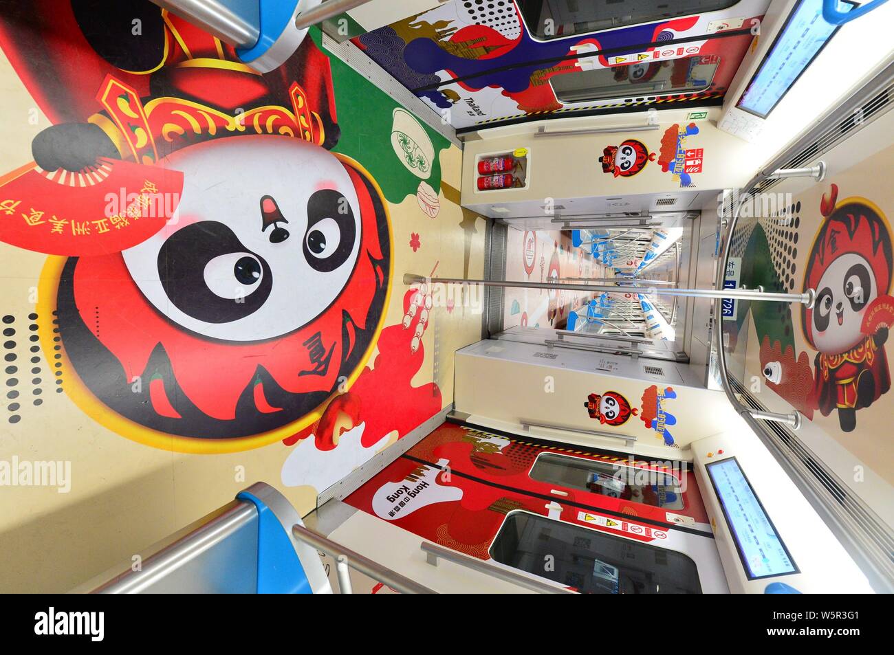 Interior view of a subway train on the Metro Line 1 featuring giant ...