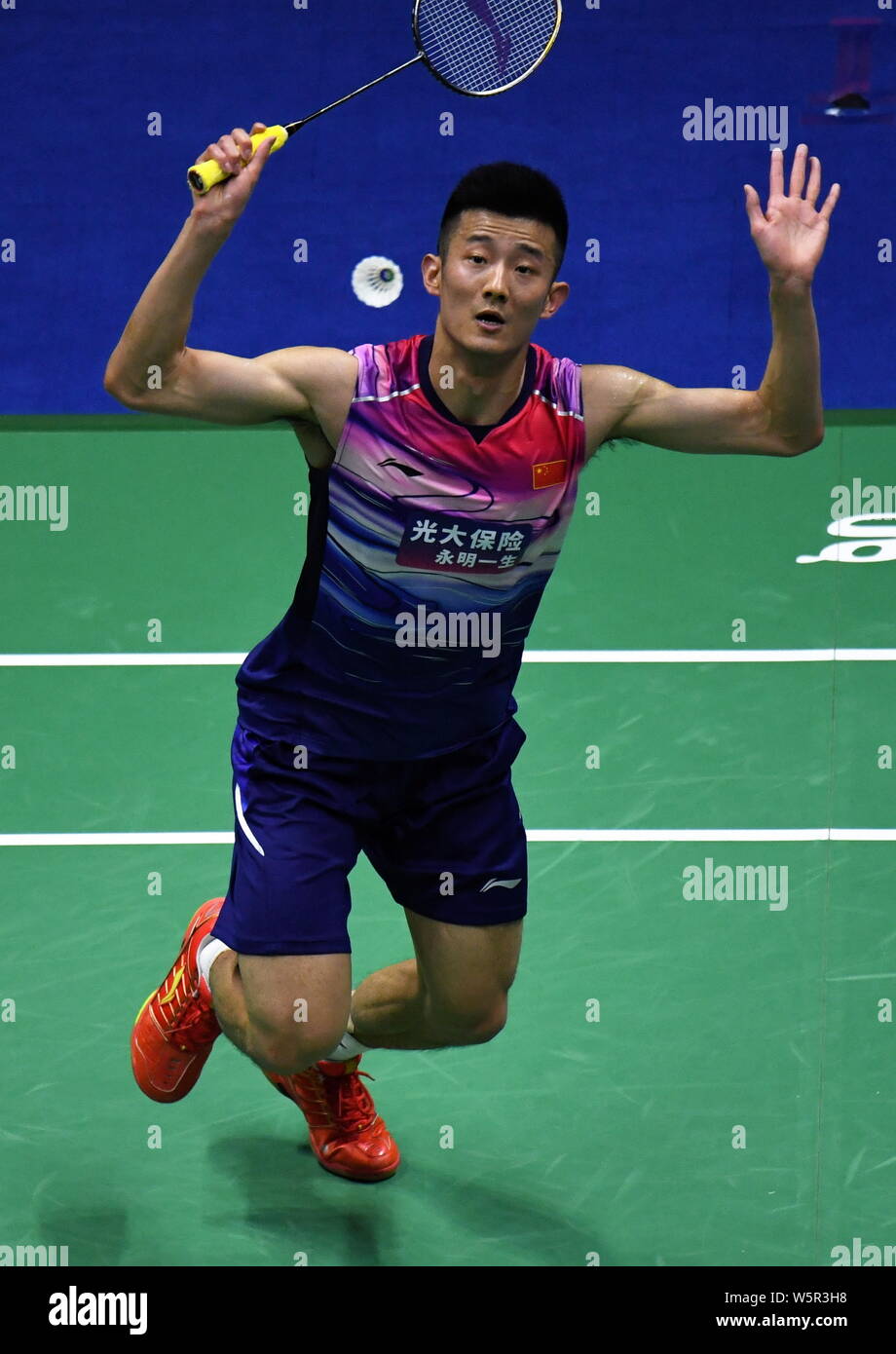 Chen Long of China returns a shot to Sameer Verma of India in their ...