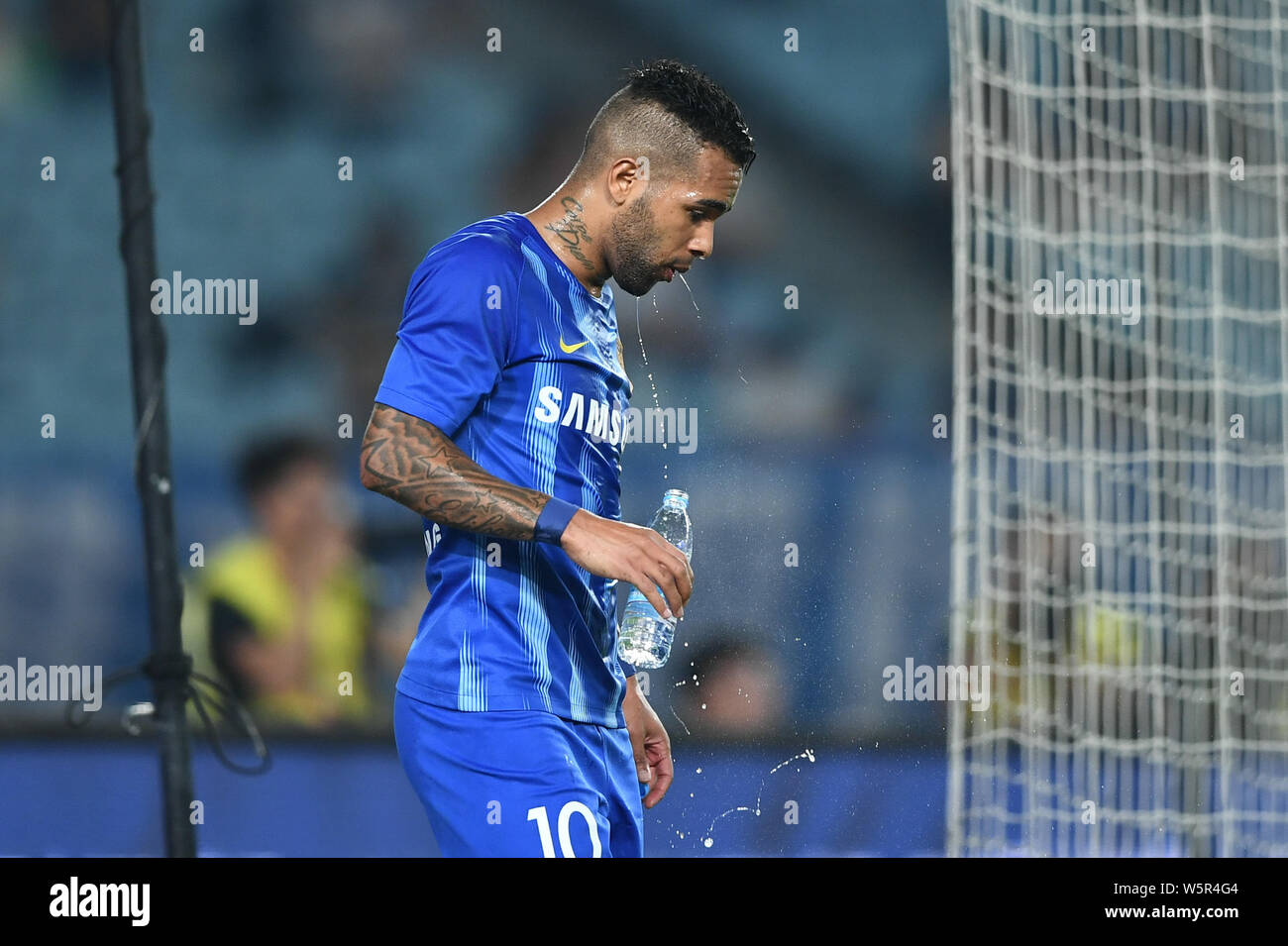 Brazilian football player Alex Teixeira of Jiangsu Suning celebrates ...