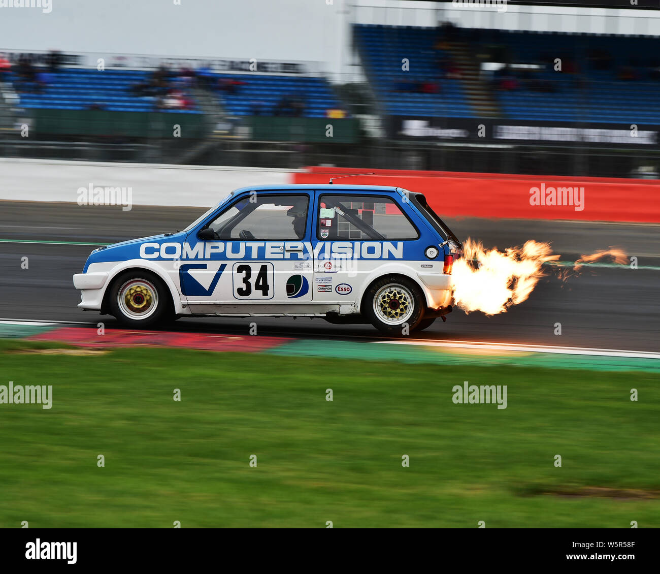 Rear wheel off the ground, burst of flame, Patrick Watts, MG Metro ...
