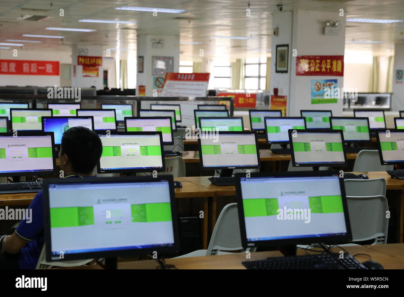 Chinese teachers mark test paper of students who attend 2018 National ...