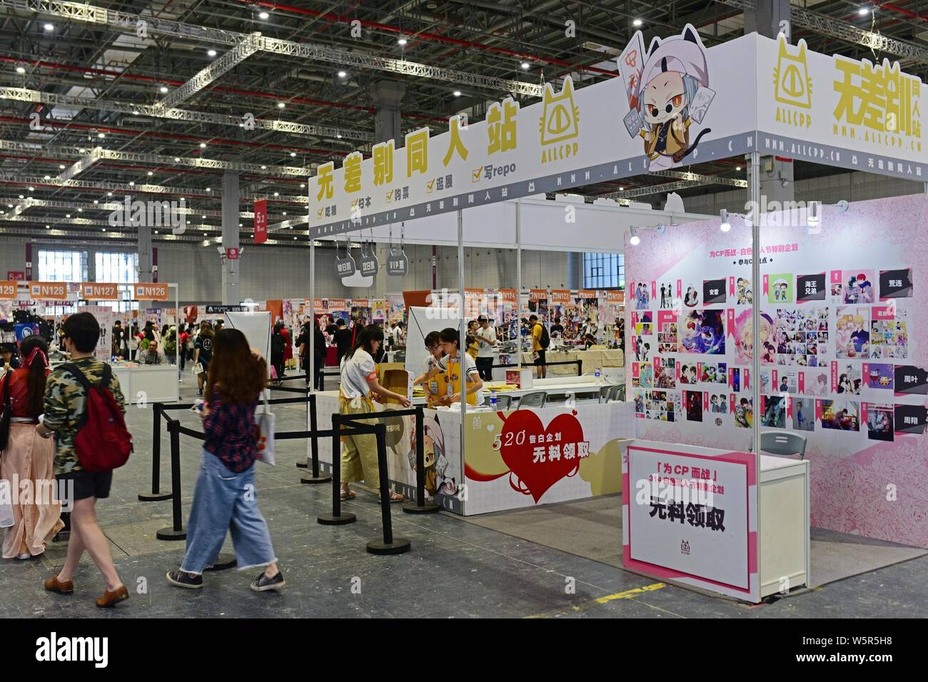 Entertainers dressed in cosplay costumes pose during the Shanghai ...