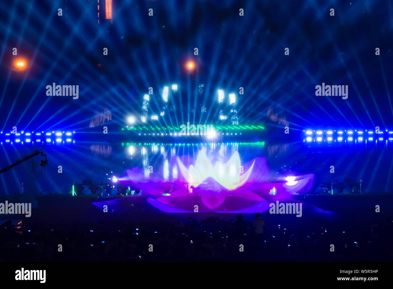 A huge lotus flower reflected by light projections is seen to mark the ...
