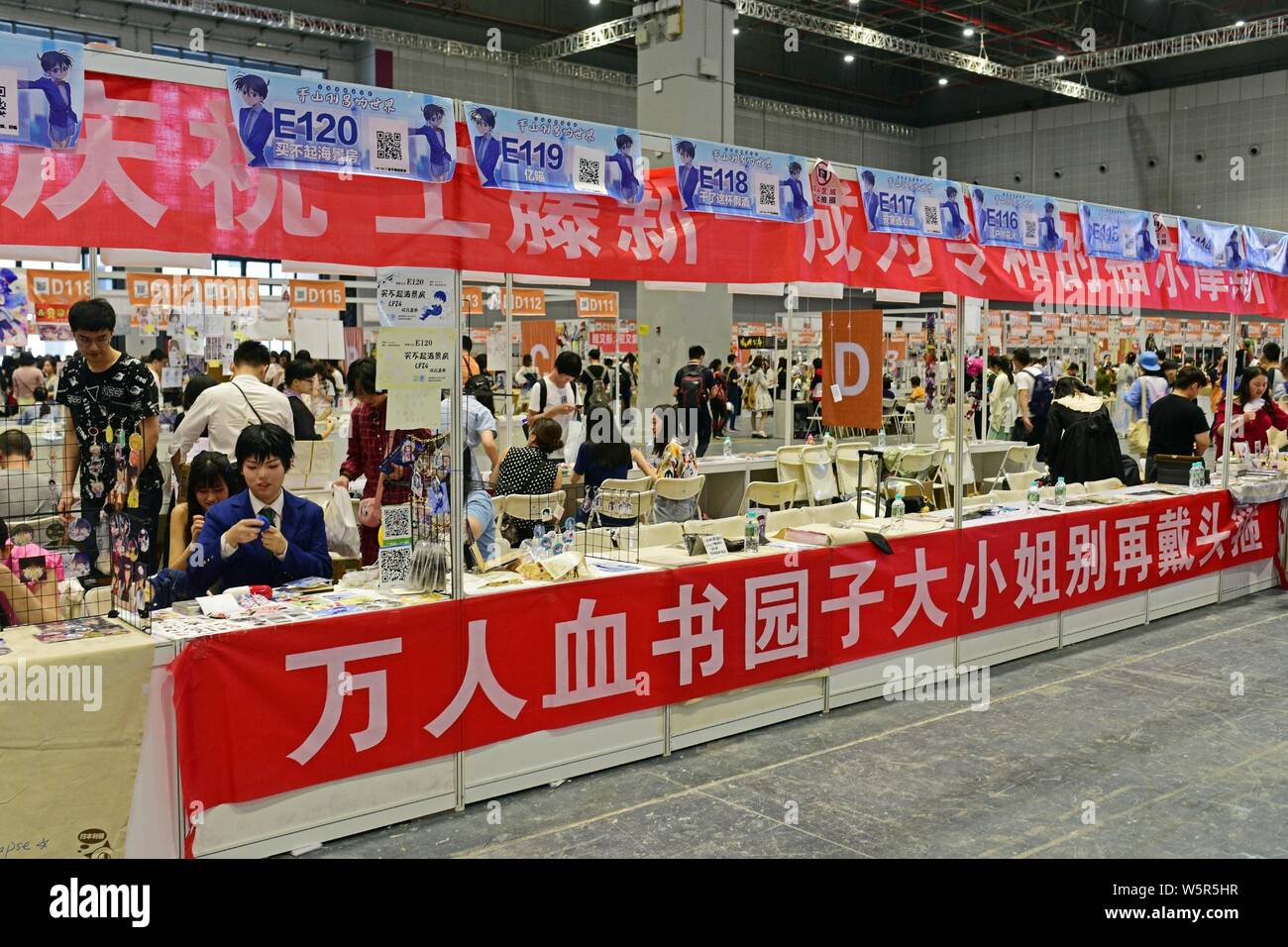 Entertainers dressed in cosplay costumes pose during the Shanghai ...