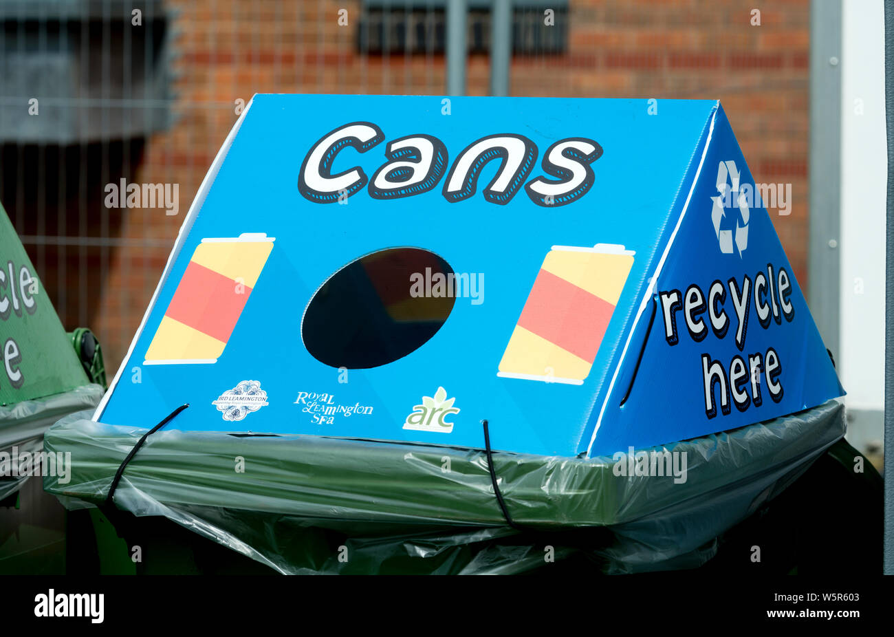 Cans recycling bin Stock Photo - Alamy