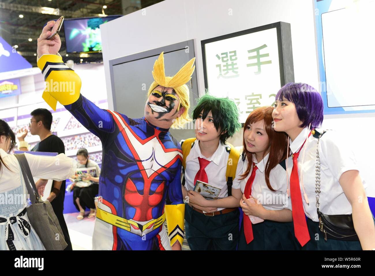 Entertainers dressed in cosplay costumes pose during the Shanghai COMICUP 24 Cosplay Showcase in ...