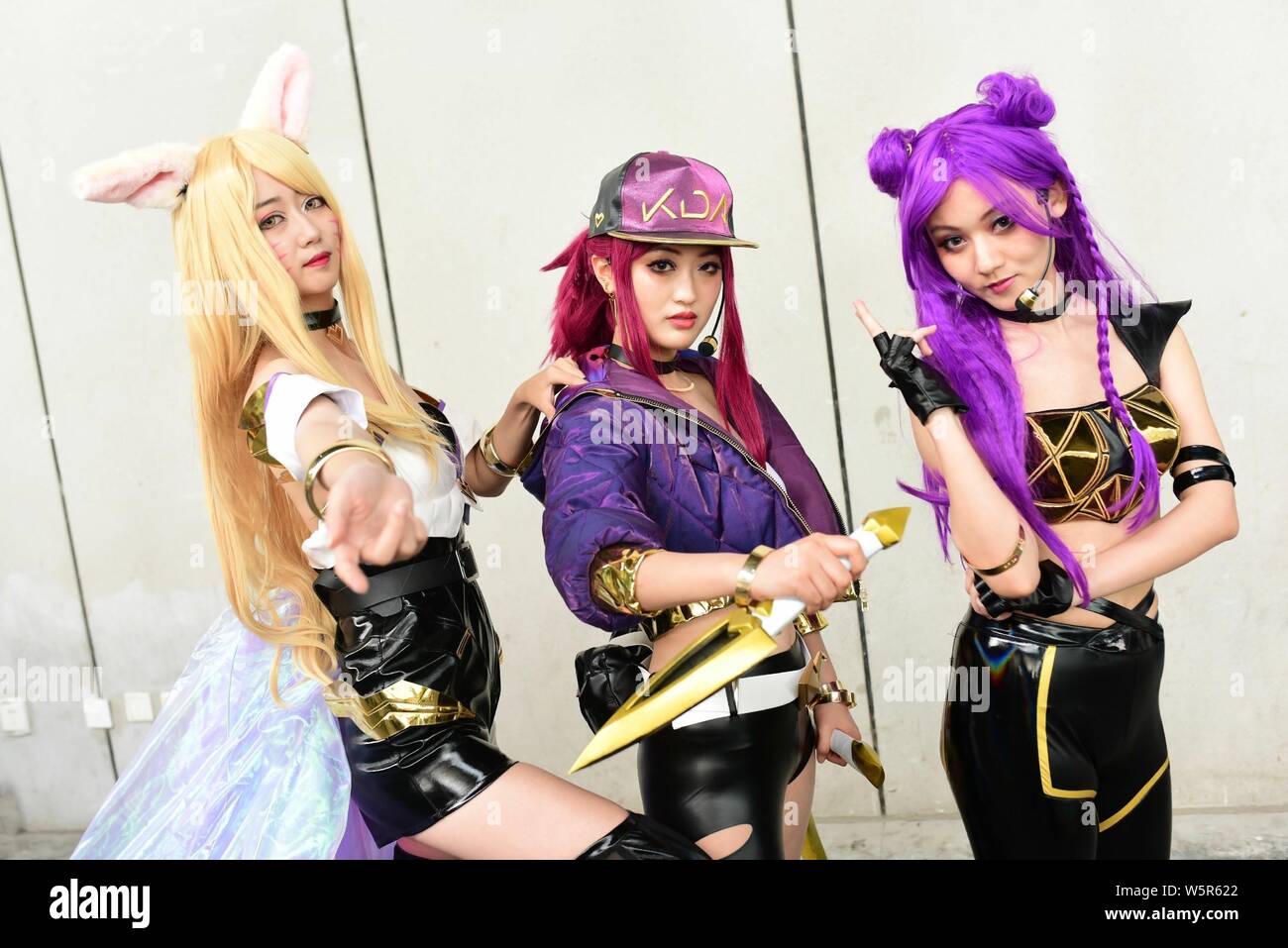 Entertainers dressed in cosplay costumes pose during the Shanghai ...
