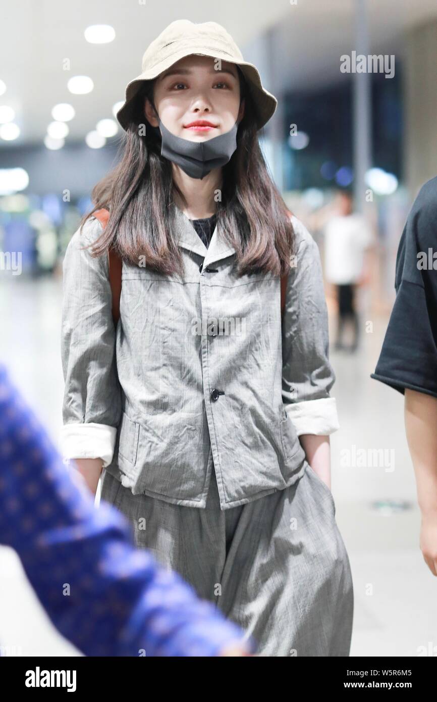 Chinese actress Ni Ni arrives at the Shanghai Hongqiao International ...