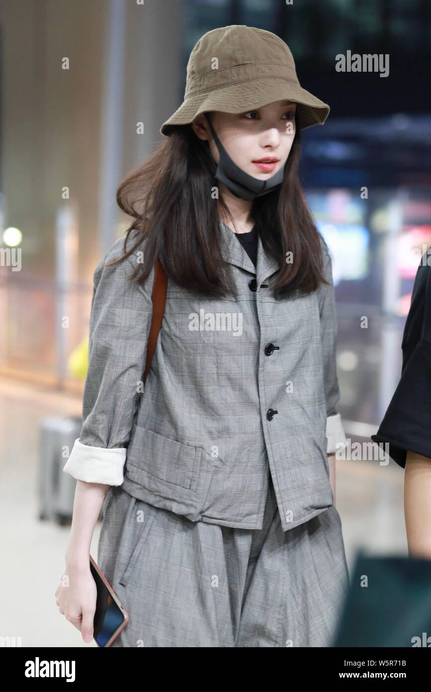 Chinese actress Ni Ni arrives at the Shanghai Hongqiao International ...