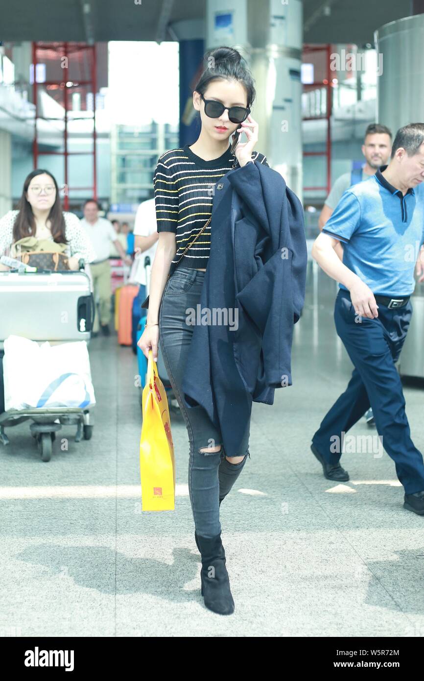 Chinese model and actress Zhang Yuxi arrives at the Beijing Capital ...