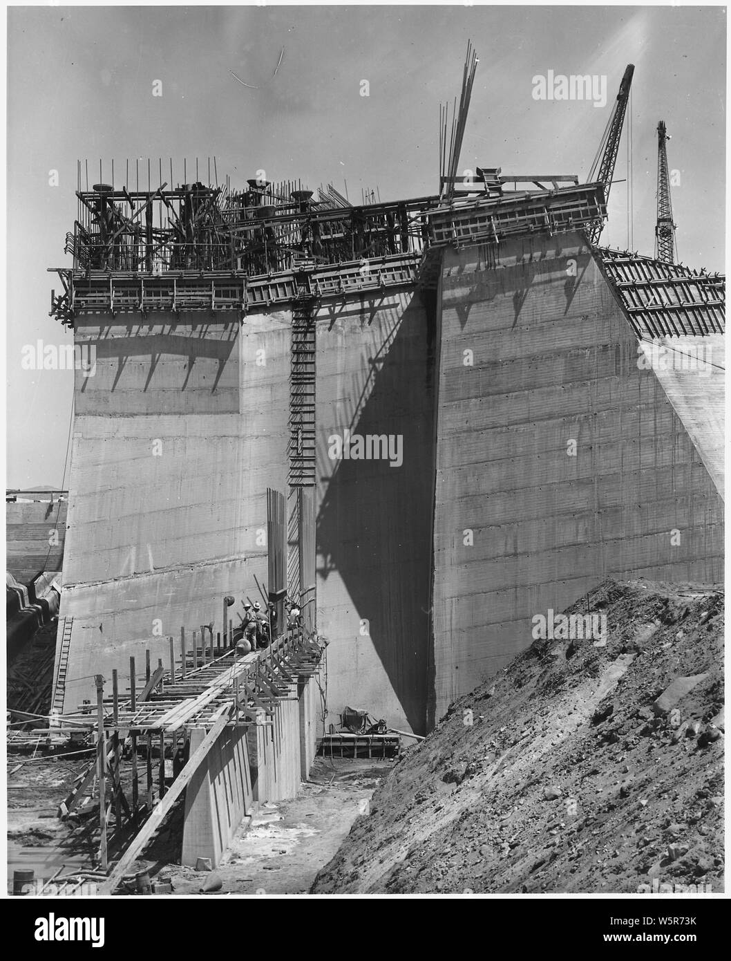 Looking east along the axis of the dam at a section of the spillway ...