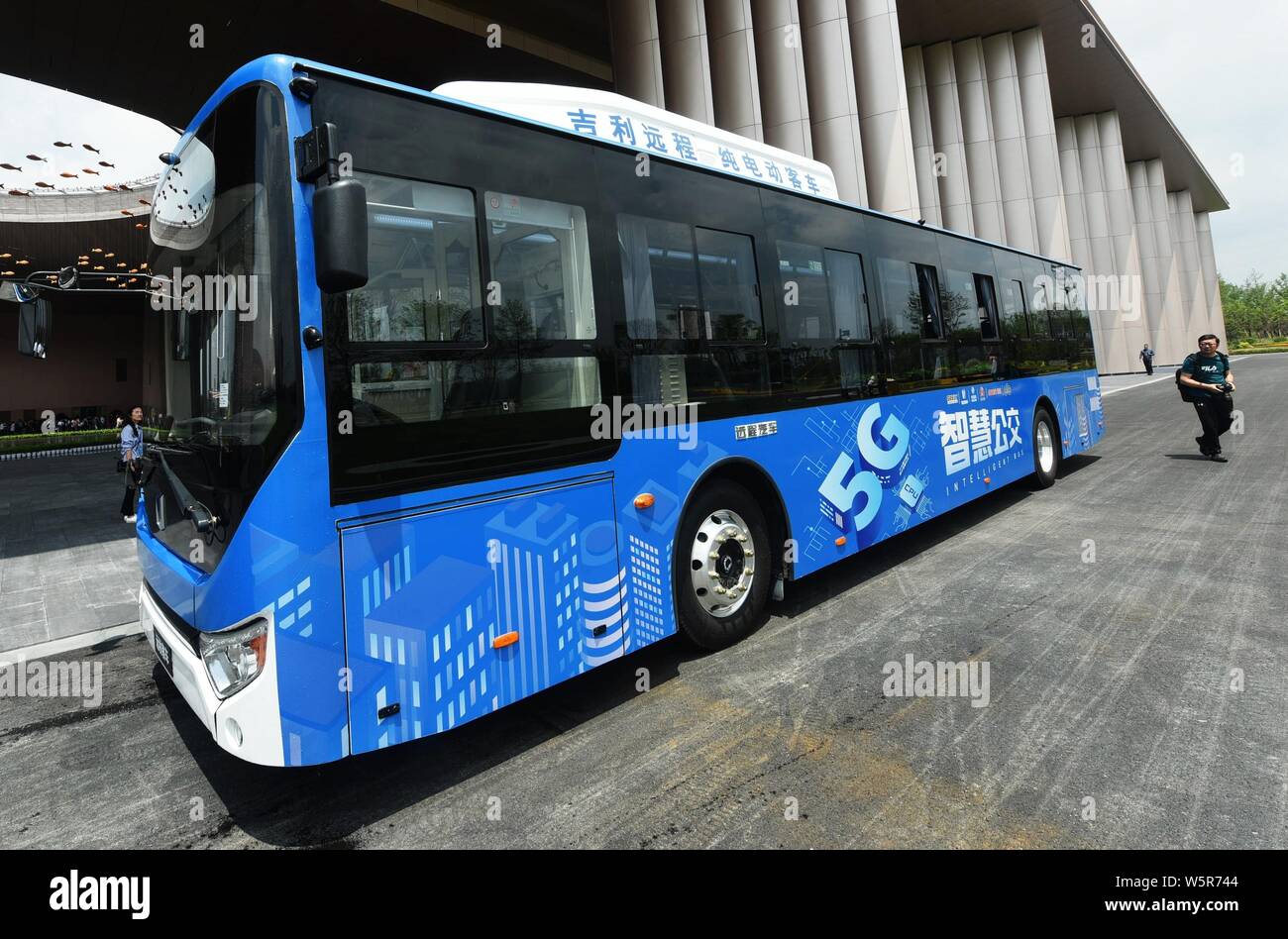 A long-distance bus equipped with its own 5G network is parked during ...