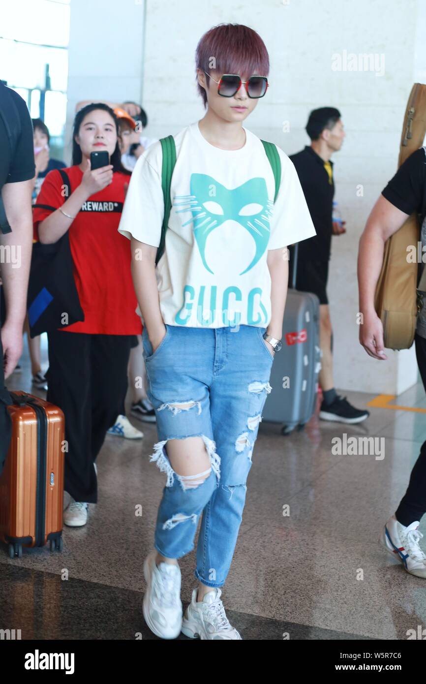 Chinese singer Chris Lee or Li Yuchun arrives at the Beijing Capital ...