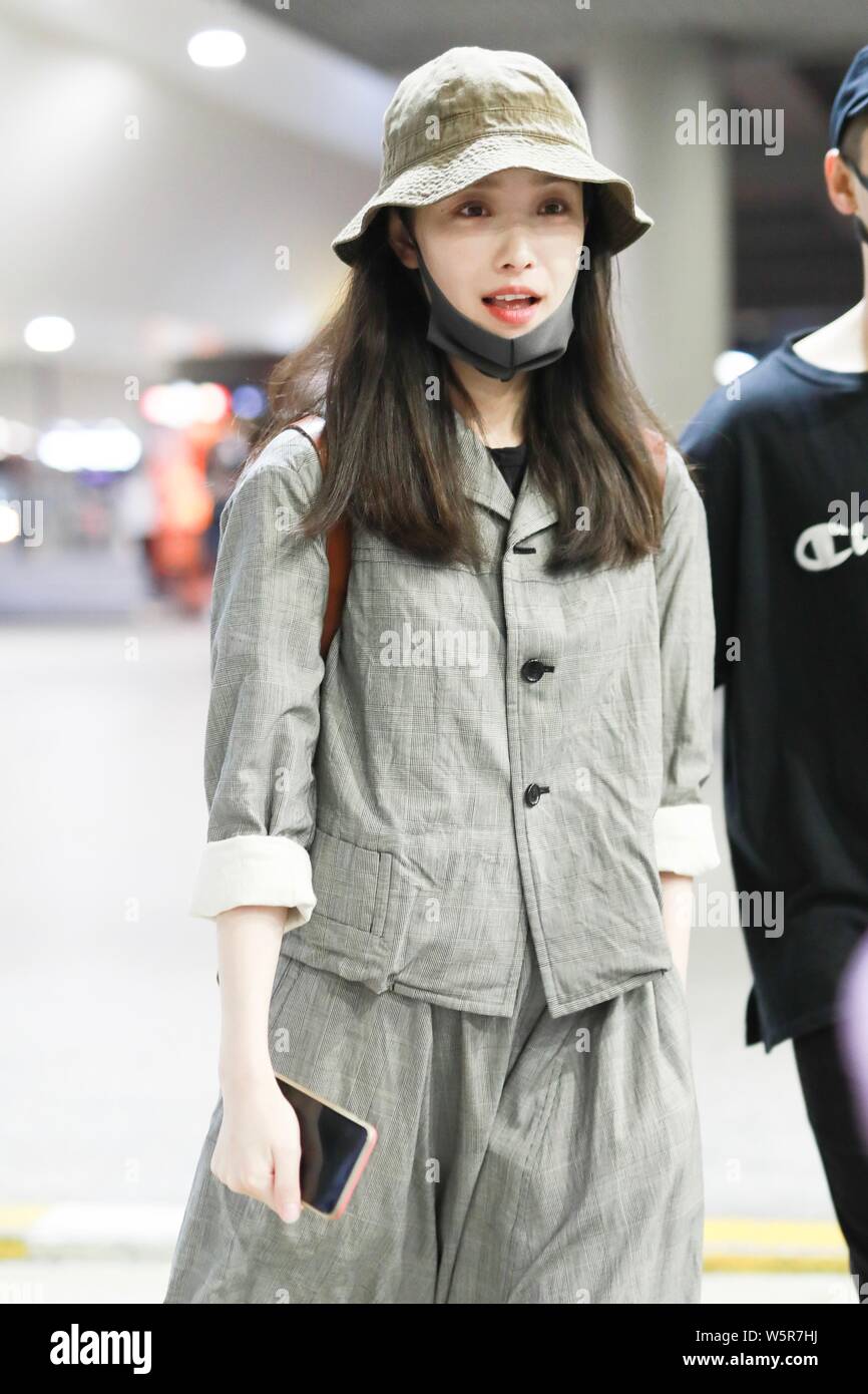 Chinese actress Ni Ni arrives at the Shanghai Hongqiao International ...
