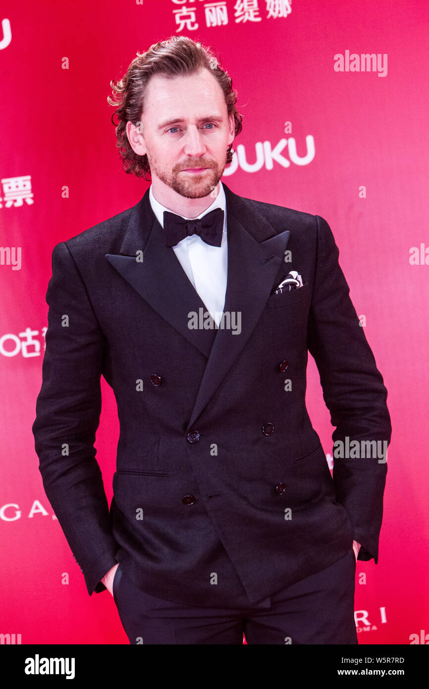 English actor and film producer Tom Hiddleston, center, arrives on the ...