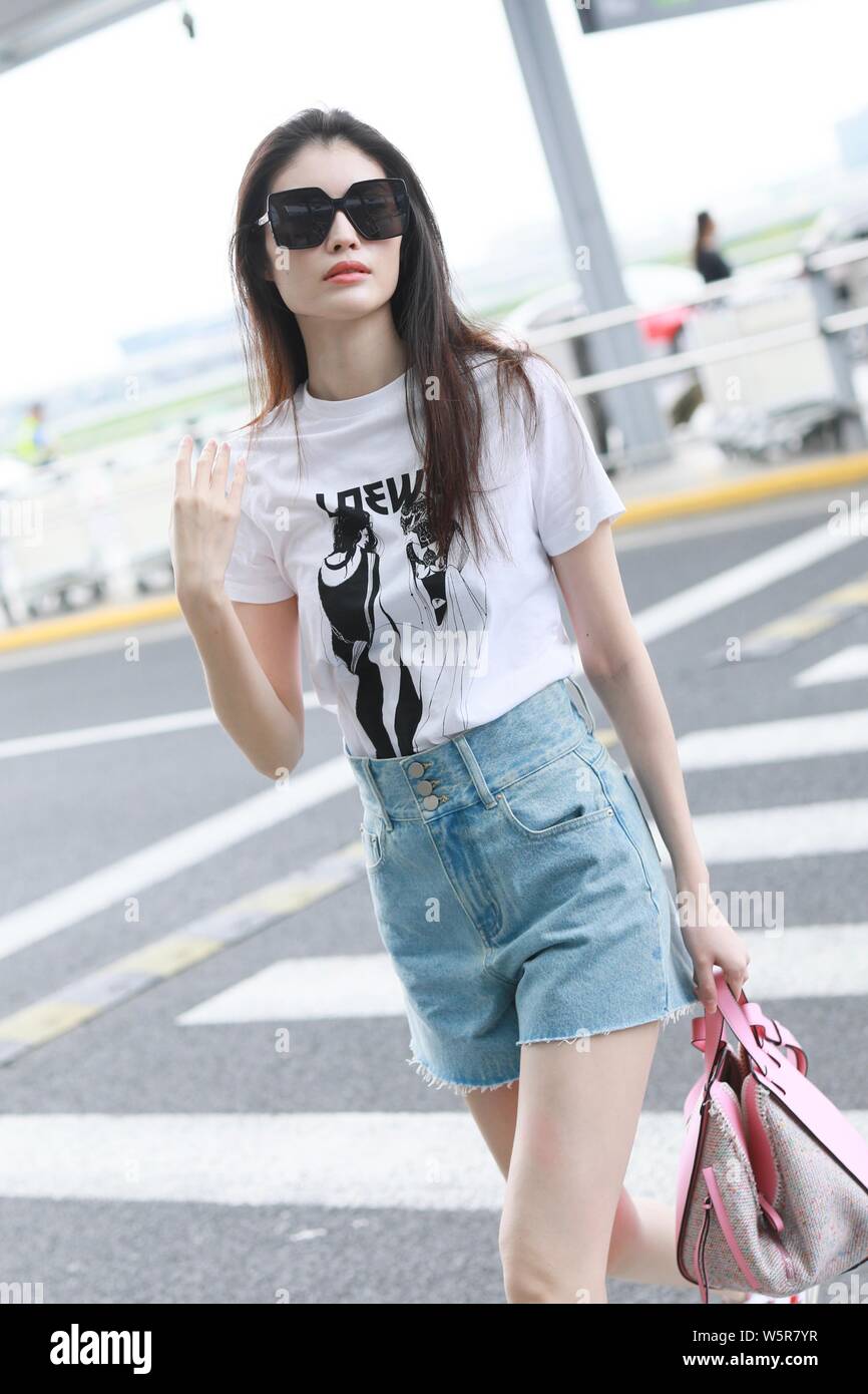 Chinese model He Sui arrives at the Shanghai Hongqiao International ...