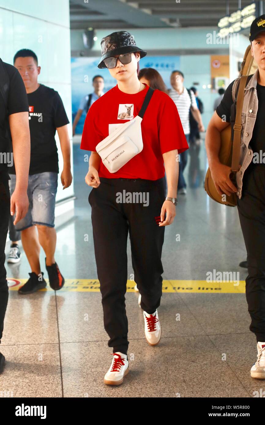 Chinese singer Chris Lee or Li Yuchun arrives at the Beijing Capital ...