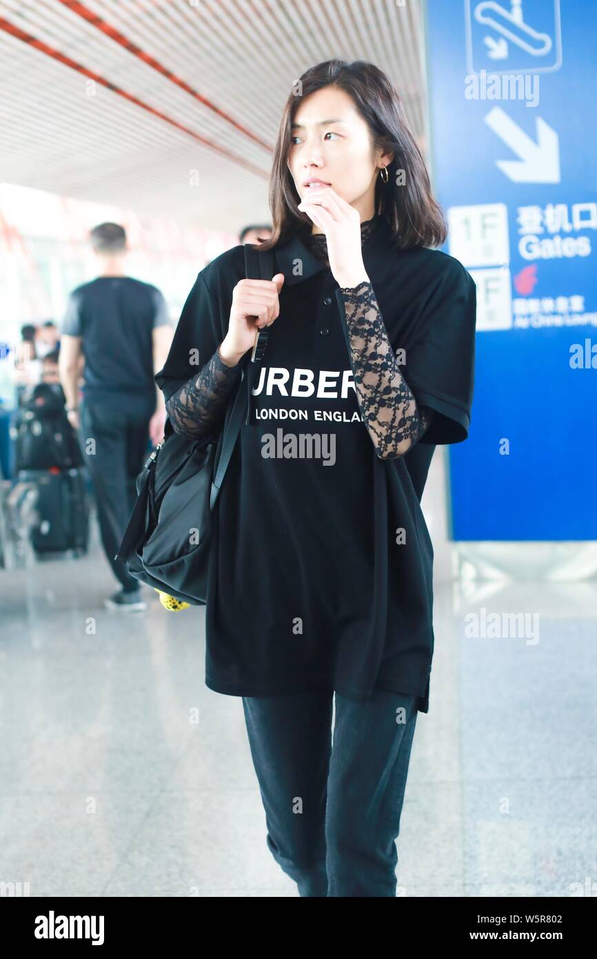 Chinese supermodel Liu Wen arrives at the Beijing Capital International ...