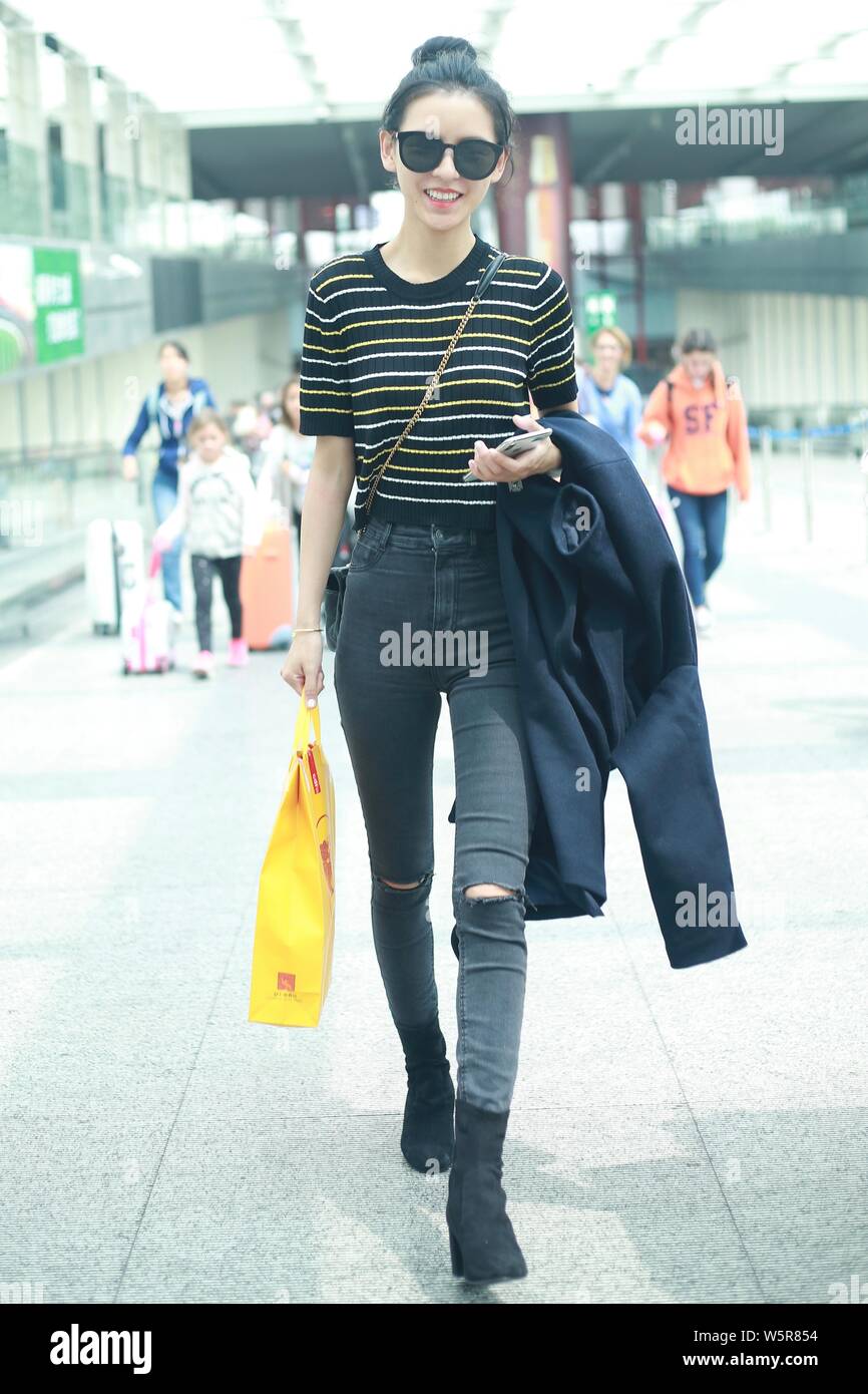Chinese model and actress Zhang Yuxi arrives at the Beijing Capital ...