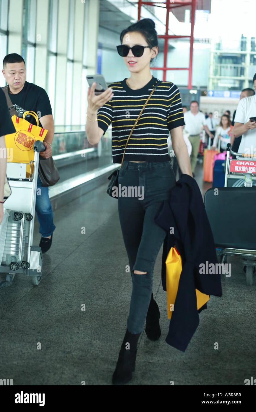 Chinese model and actress Zhang Yuxi arrives at the Beijing Capital ...