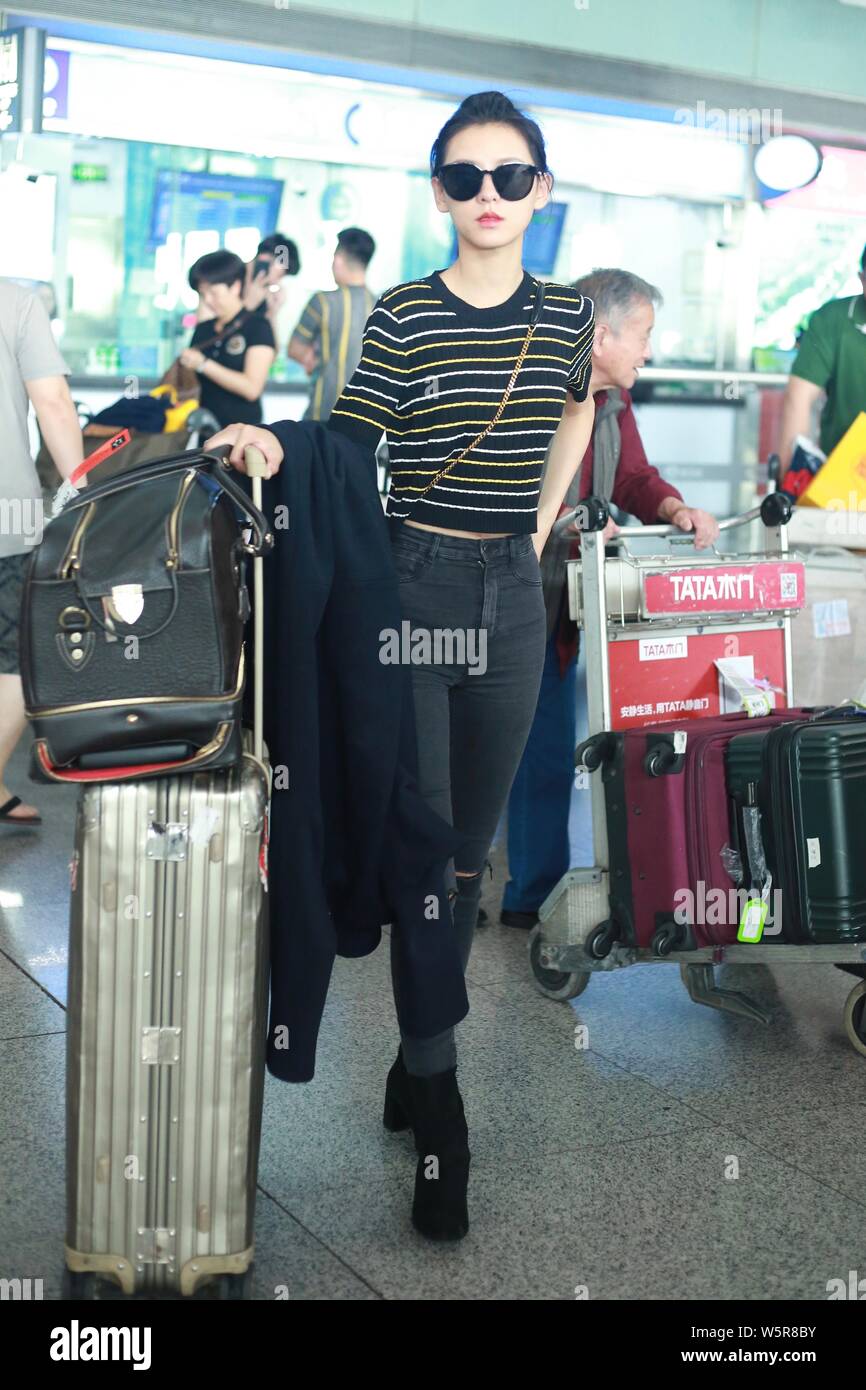 Chinese model and actress Zhang Yuxi arrives at the Beijing Capital ...
