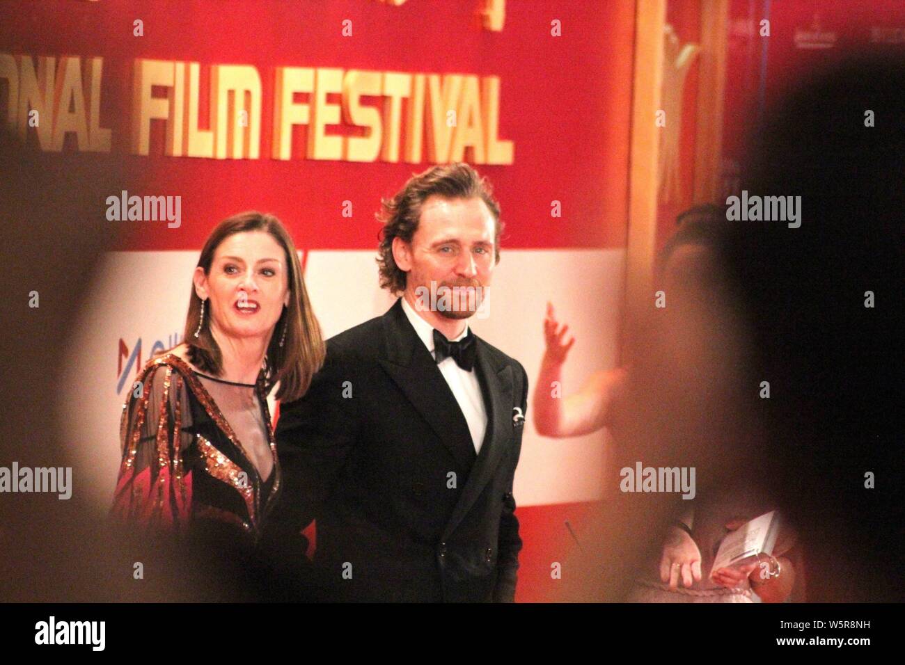 English actor and film producer Tom Hiddleston, center, arrives on the ...