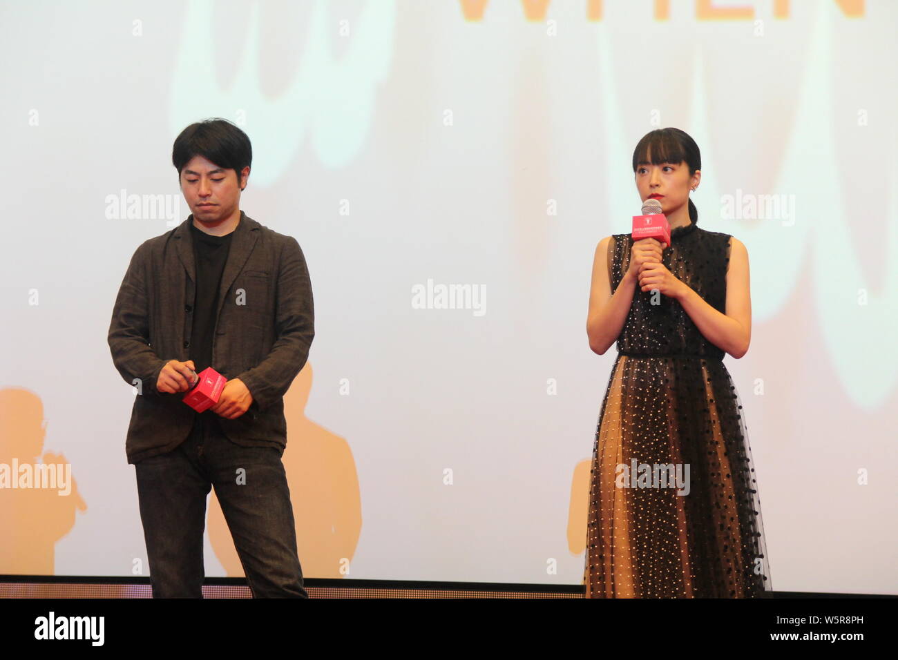 Japanese actress Mao Inoue, right, and film director Yuya Ishii attend a fan meeting for movie ...