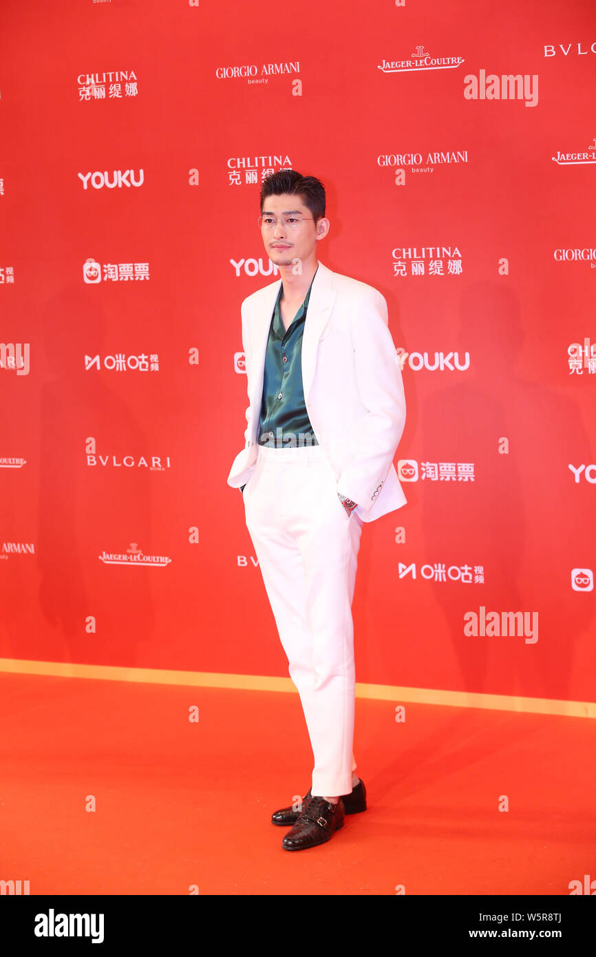 Chinese actor Zhang Han arrives on the red carpet for the opening ...