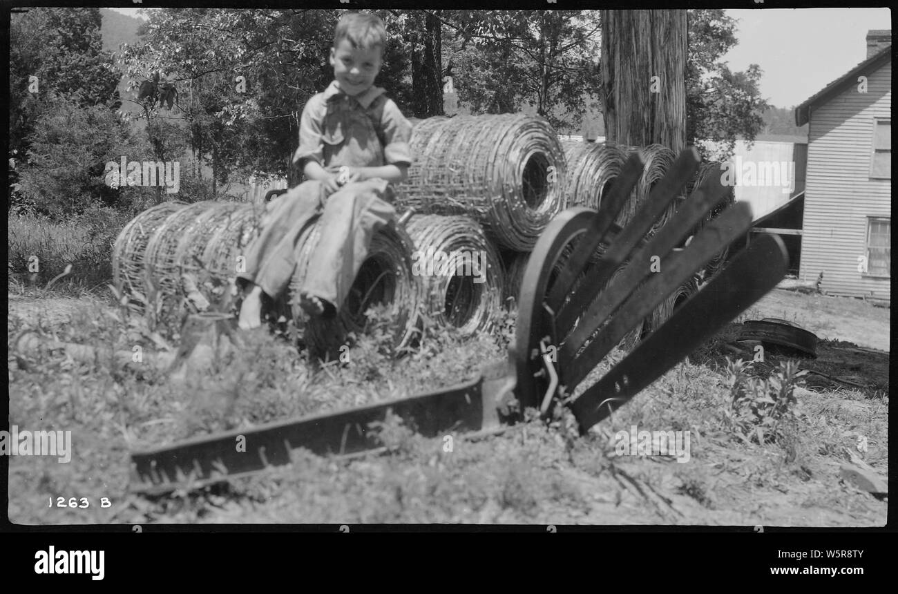 Lowry farm, small boy smiling Stock Photo - Alamy