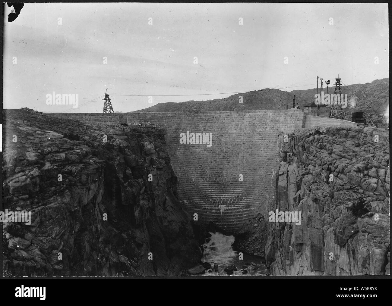 Lower face of Pathfinder Dam, showing location of loaded drill holes ...