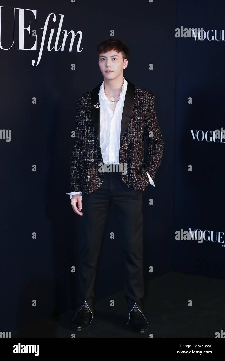 Hong Kong singer and actor William Chan poses as he arrives on the red ...