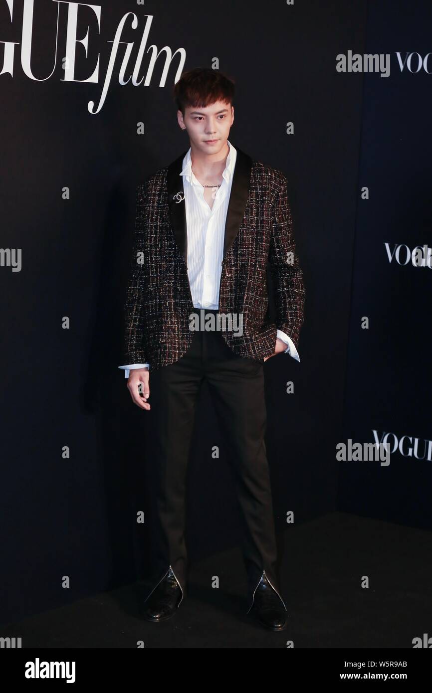 Hong Kong singer and actor William Chan poses as he arrives on the red ...