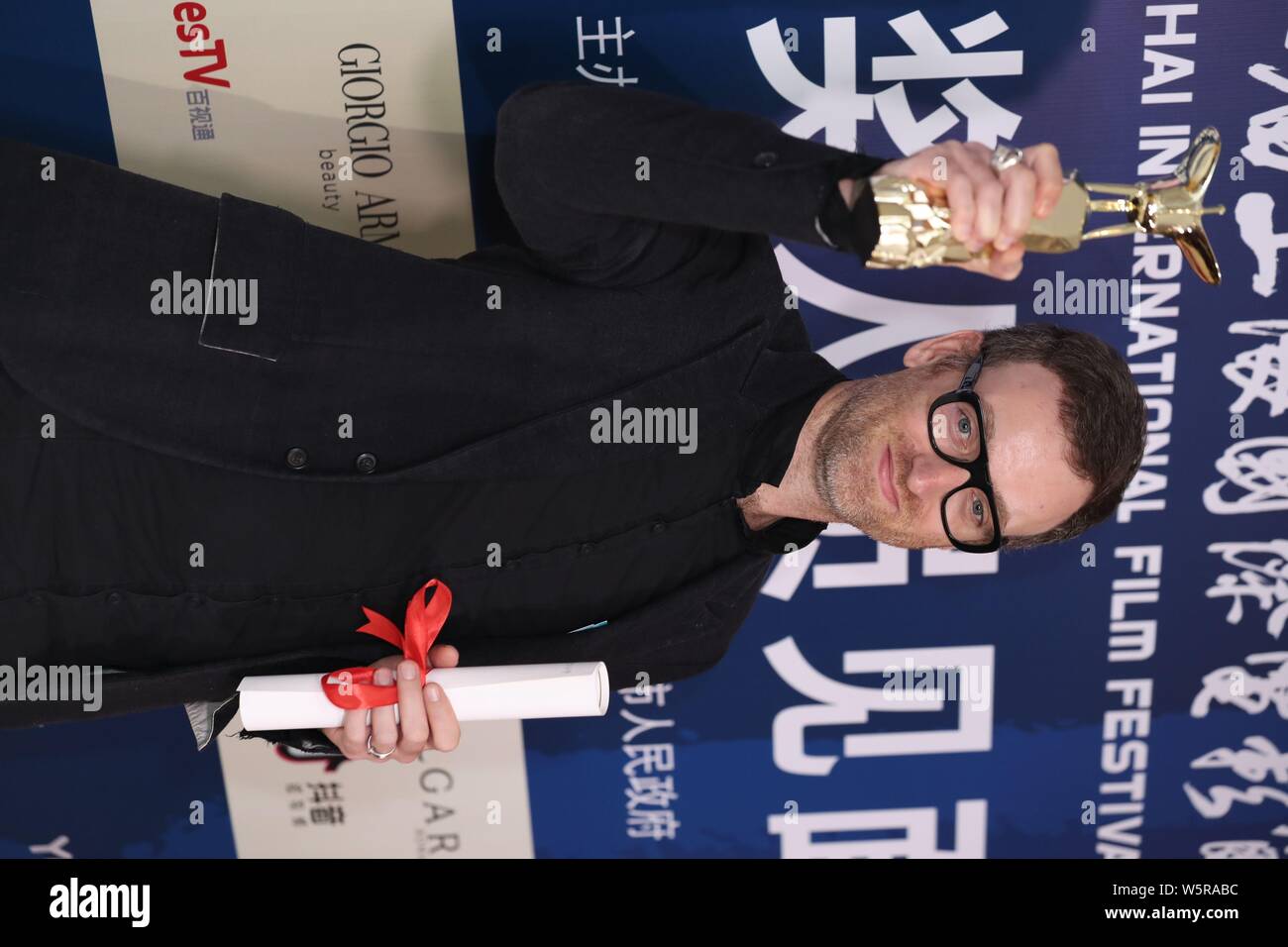 American born Jake Pollock poses with his trophy after winning "Best ...