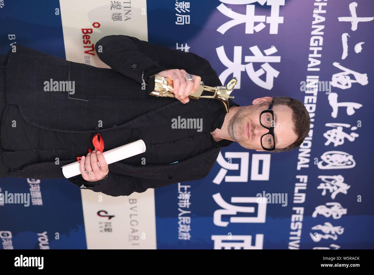American born Jake Pollock poses with his trophy after winning "Best ...