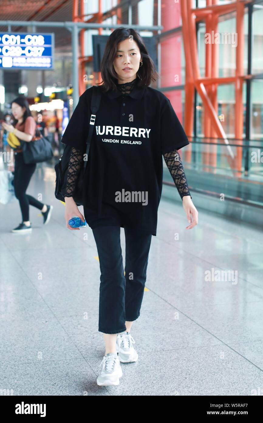 Chinese supermodel Liu Wen arrives at the Beijing Capital International ...