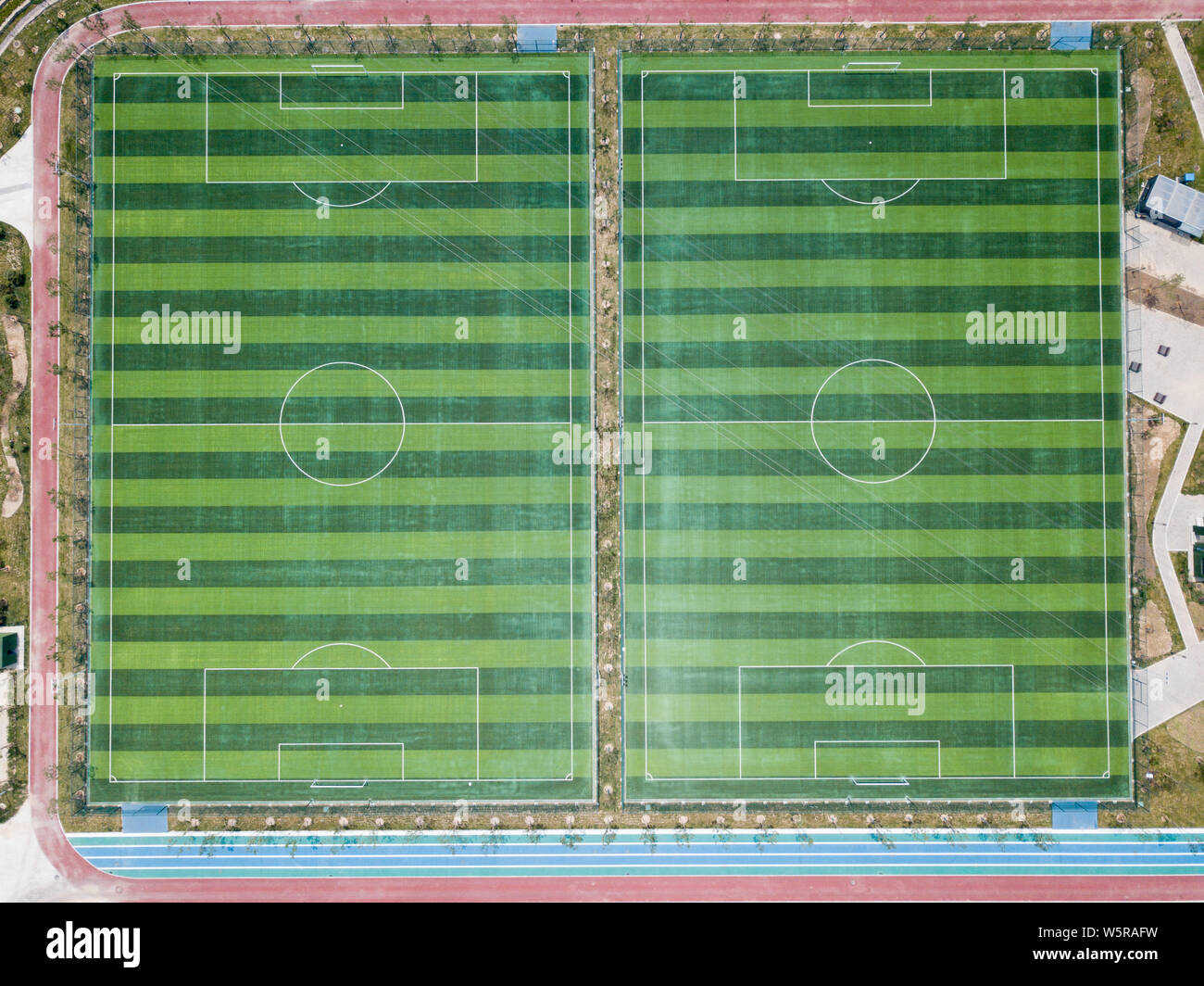Aerial view of four football pitches transformed from landfills in ...