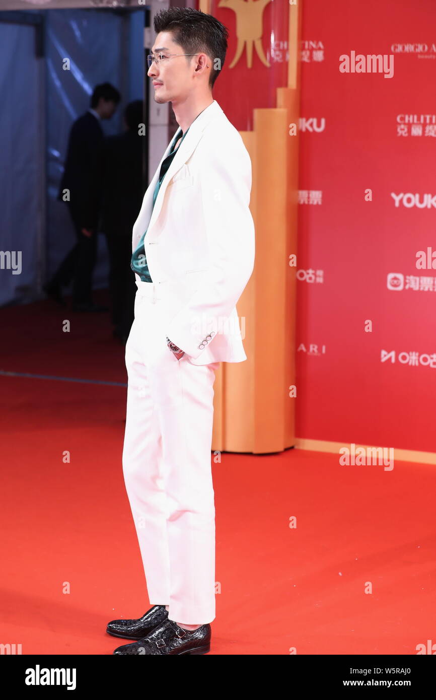 Chinese actor Zhang Han arrives on the red carpet for the opening ...