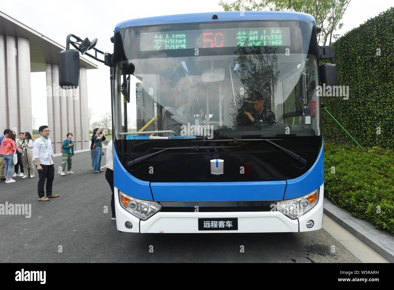 A long-distance bus equipped with its own 5G network is parked during ...