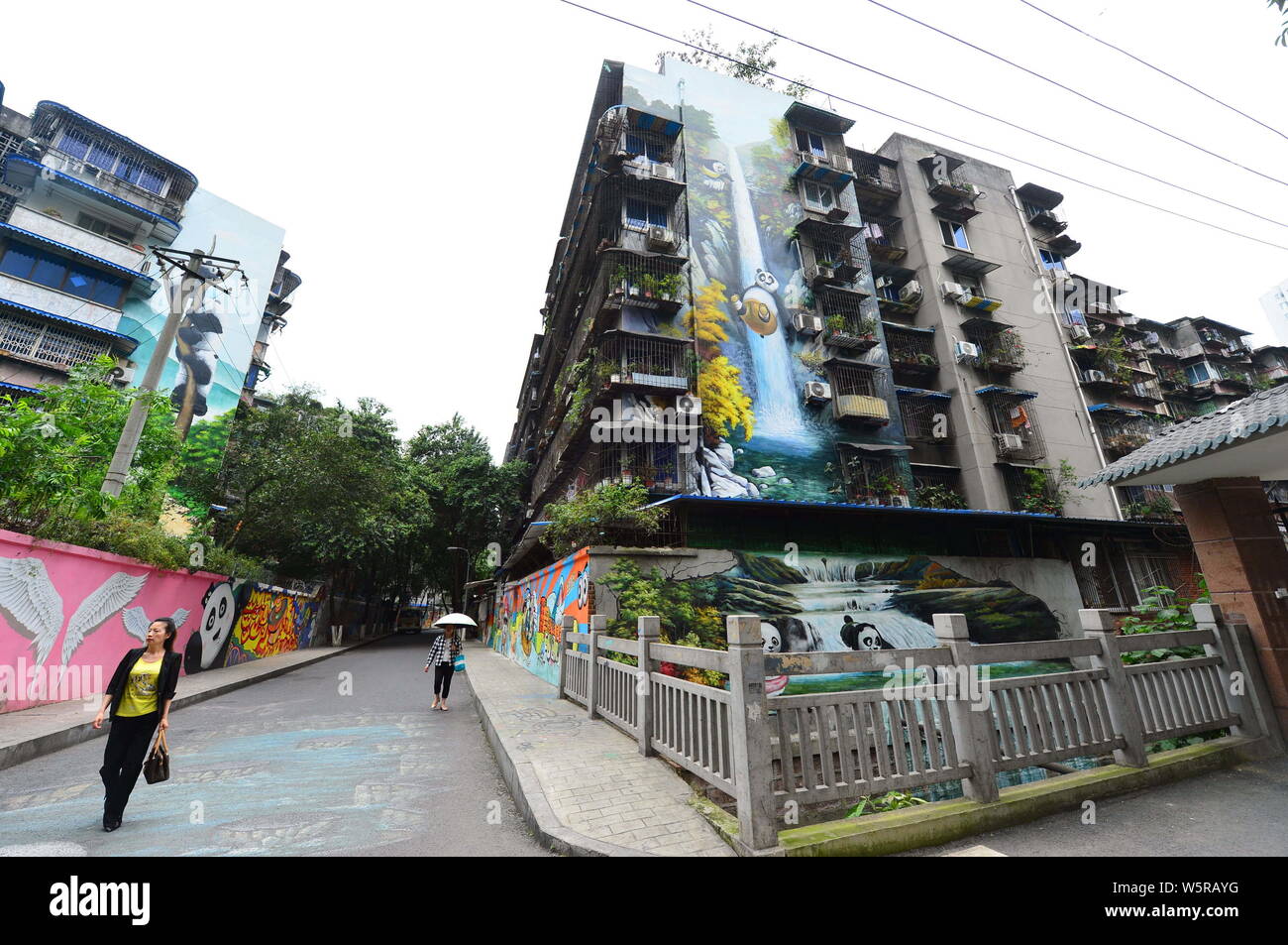 Colorful wall paintings feature giant pandas in an alley in Chengdu ...