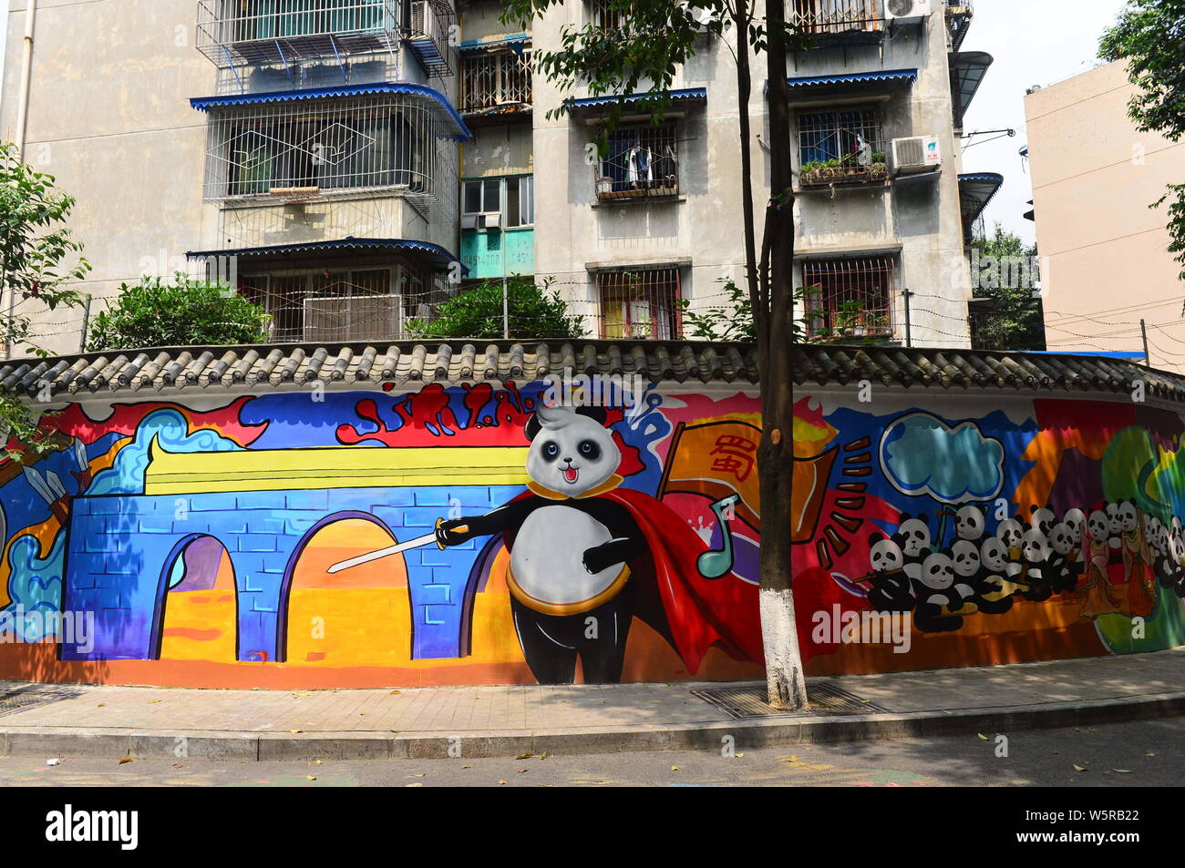 Colorful wall paintings feature giant pandas in an alley in Chengdu ...