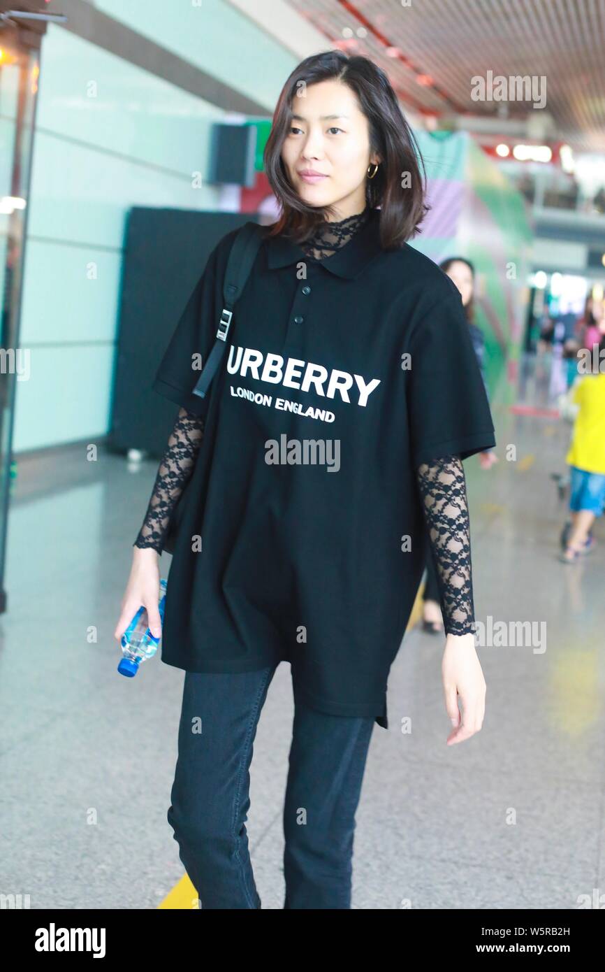 Chinese supermodel Liu Wen arrives at the Beijing Capital International ...