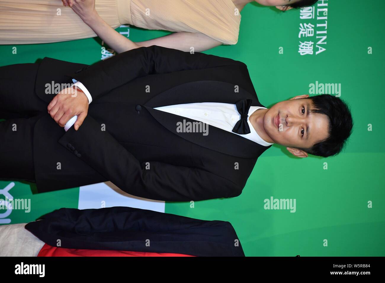 Chinese actor Gao Xin arrives on the red carpet for the 25th Shanghai ...