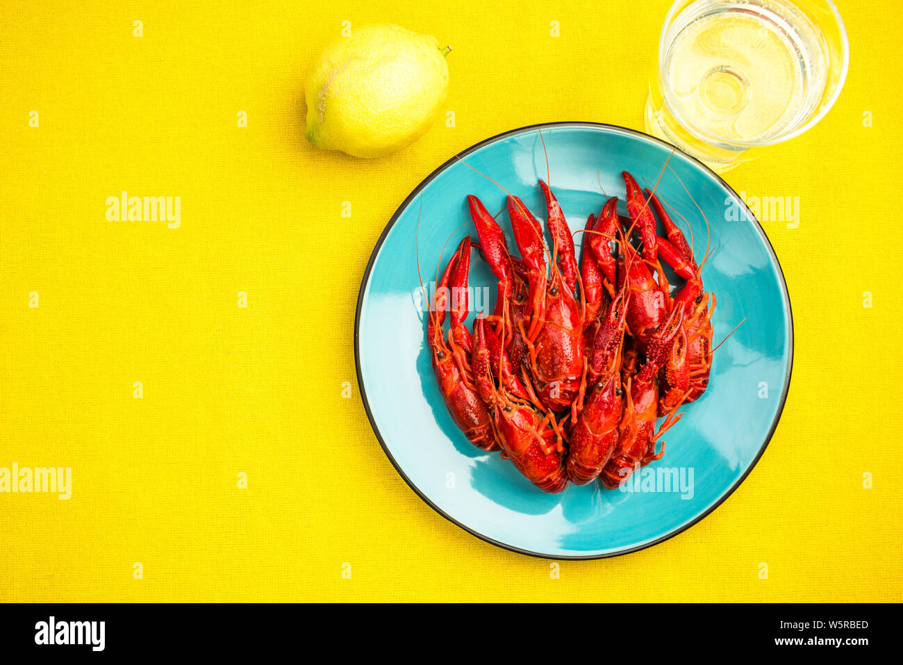Red Crayfish on Blue Plate and Yellow Table,Modern Colors,Top View ...