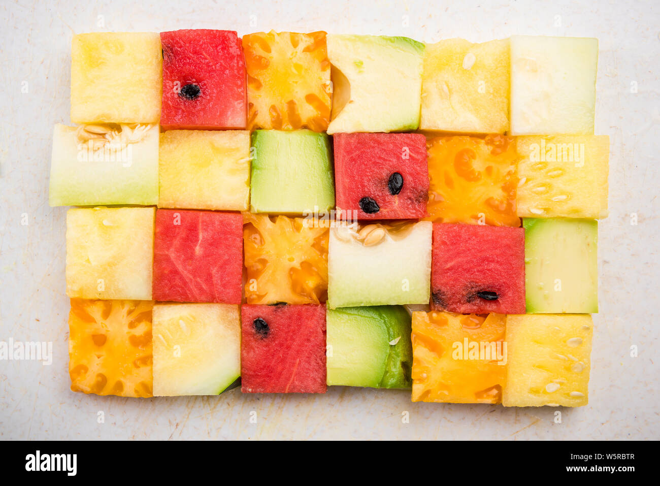 Healthy Background Made from Square Fruit Pieces, Close Up View Stock ...