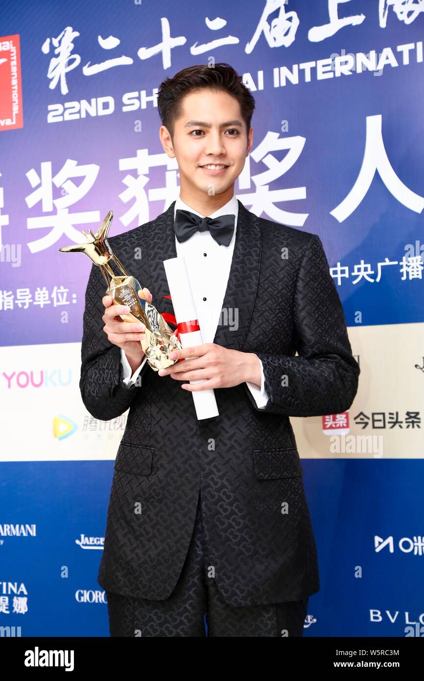Japanese singer and actor Ryota Katayose poses with trophy after the ...