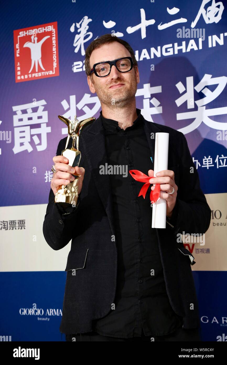 American born Jake Pollock poses with his trophy after winning "Best ...